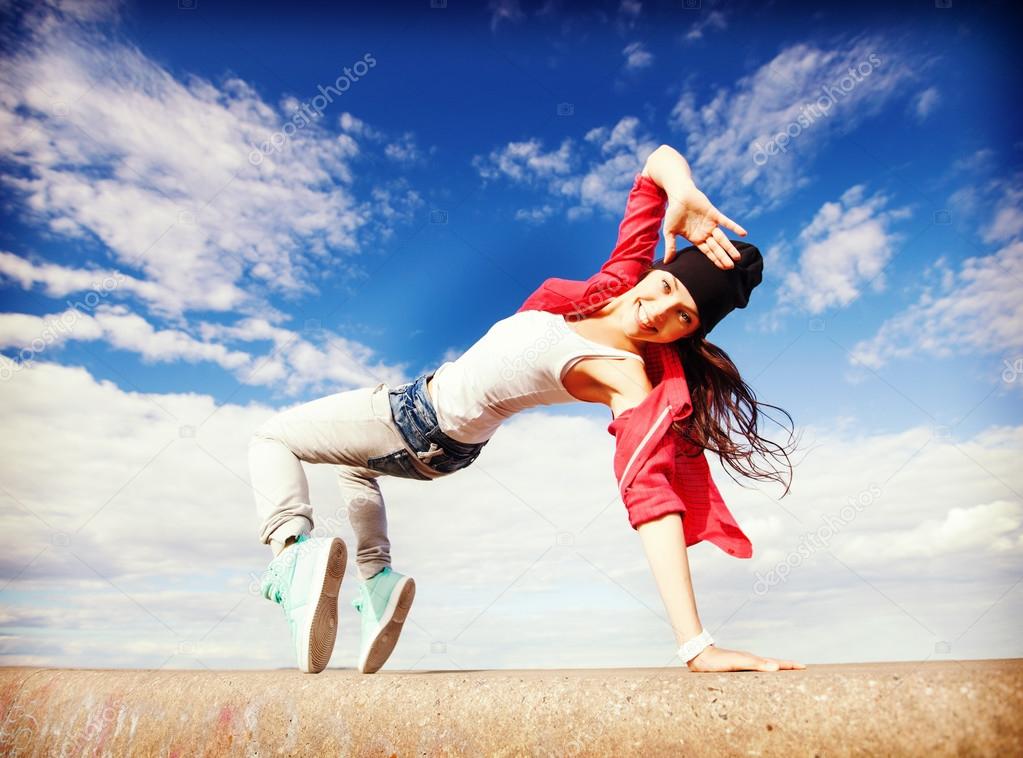 Beautiful dancing girl in movement Stock Photo by ©Syda_Productions ...