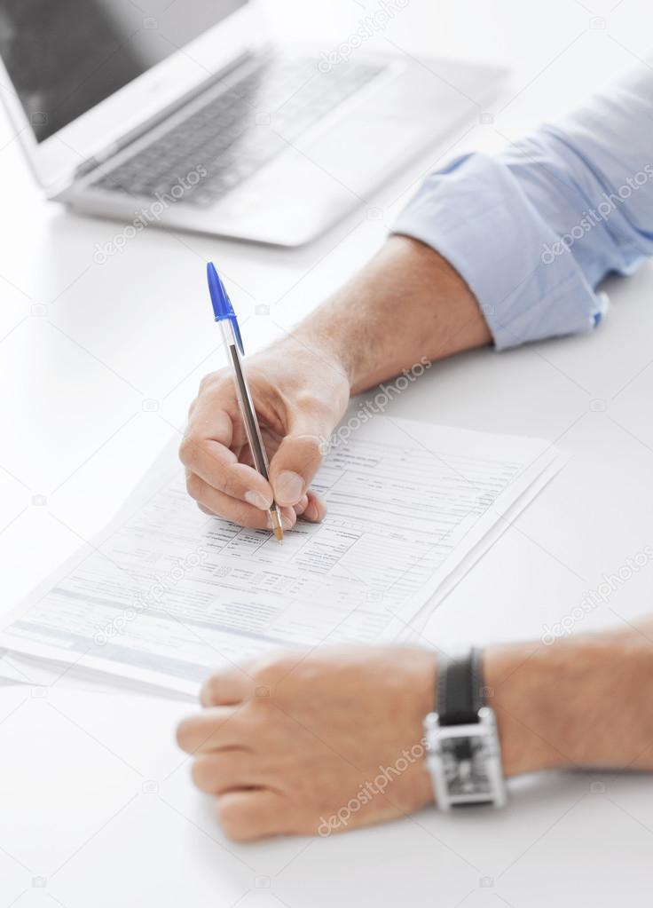 Man signing a contract Stock Photo by ©Syda_Productions 45286103