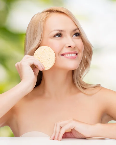 Beautiful woman with sponge - Stock Image - Everypixel