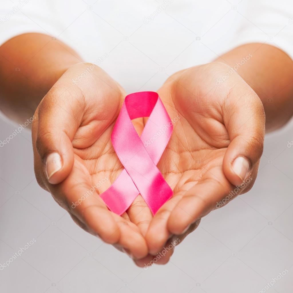 Hands holding pink breast cancer awareness ribbon Stock Photo by ©Syda ...