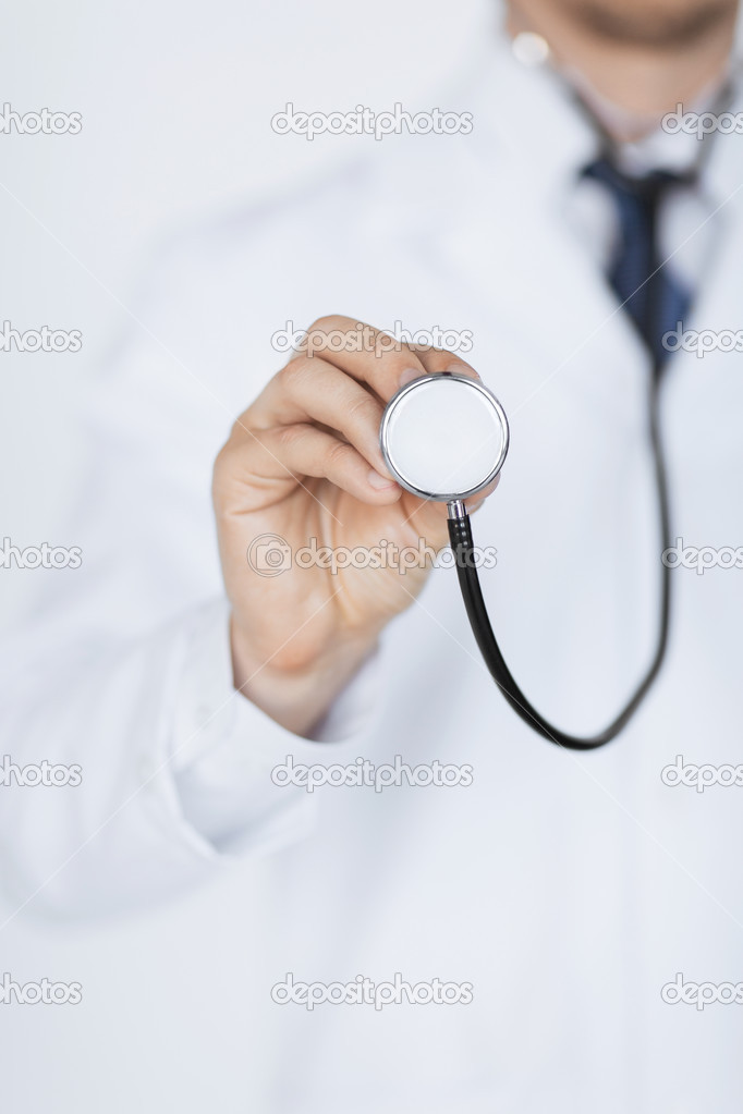Doctor hand with stethoscope listening something — Stock Photo © Syda ...