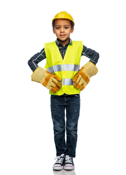 Little boy in safety vest and helmet showing power Stock Photo by ©Syda ...