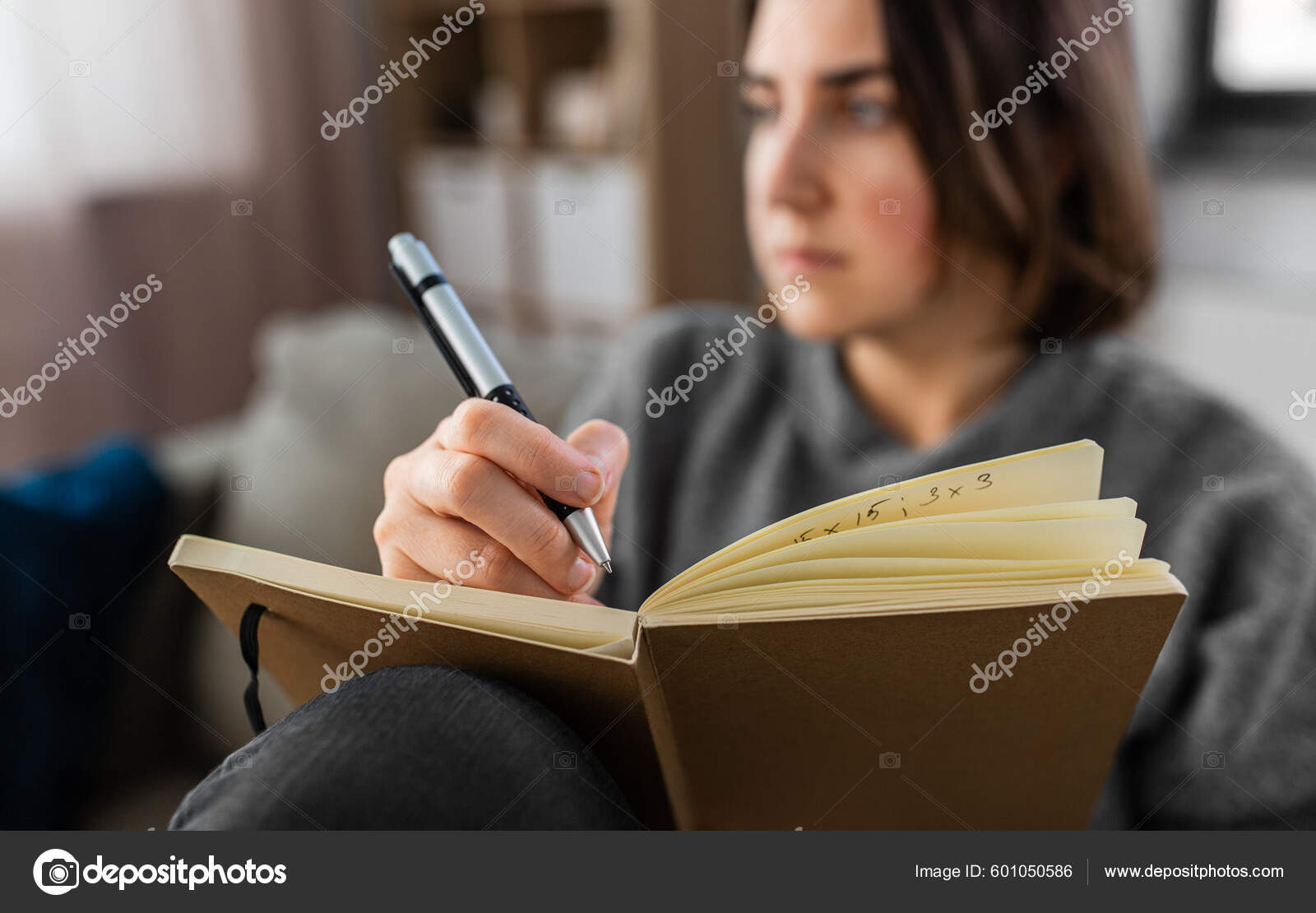 Sad Girl Writing In Diary