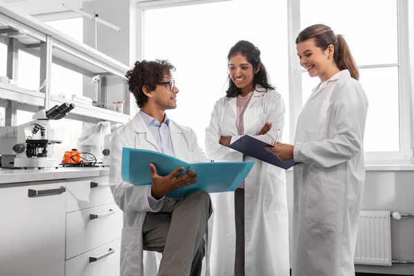 science research, work and people concept - international group of ...