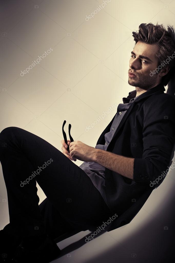 Exhausted handsome man dreaming about rest Stock Photo by ©konradbak ...