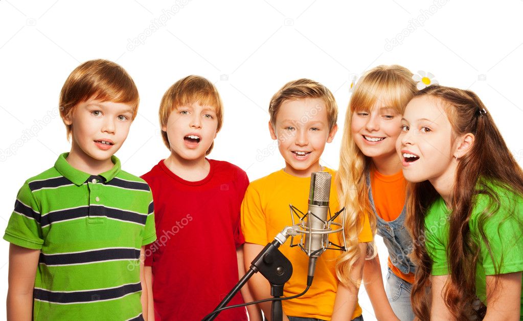 Group of 8 years old kids with microphone — Stock Photo © serrnovik ...