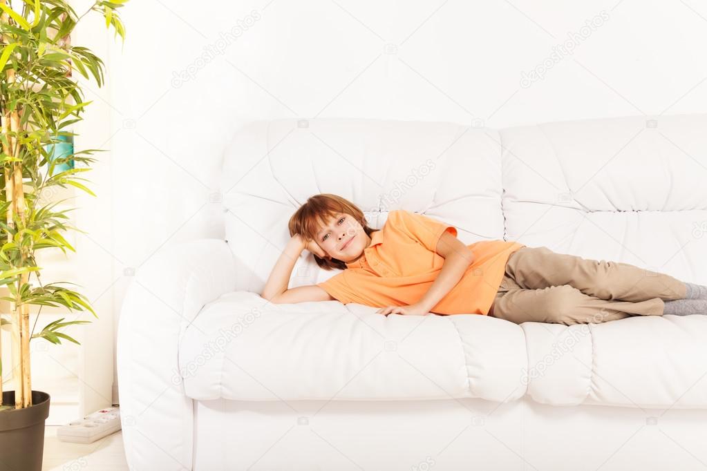 Resting at home on sofa — Stock Photo © serrnovik #32010655