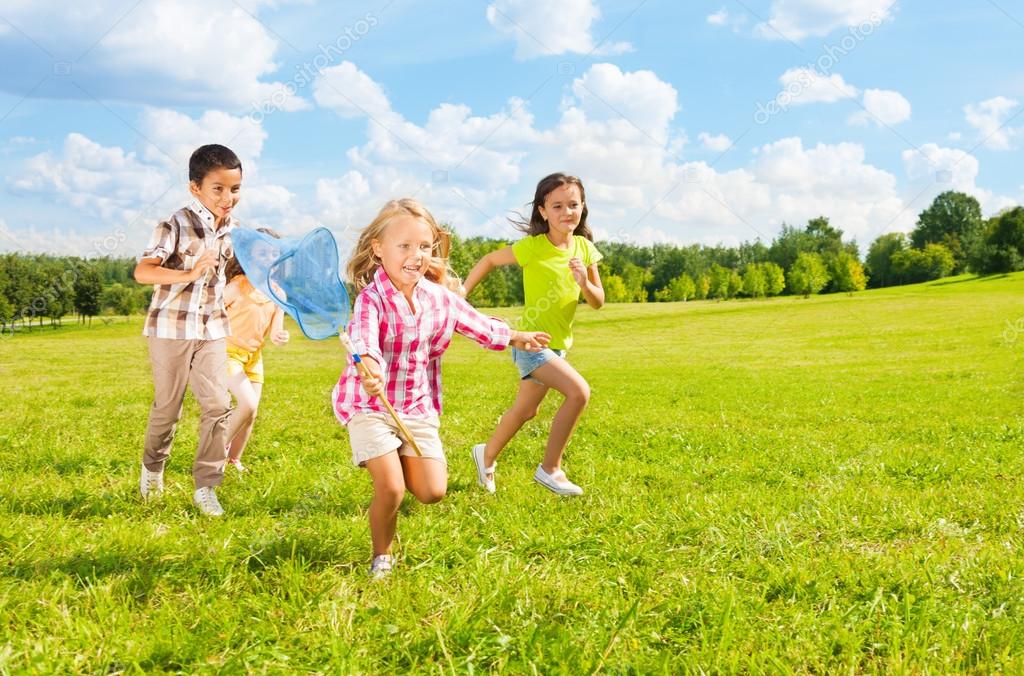 Kids chasing butterfly — Stock Photo © serrnovik #36199521