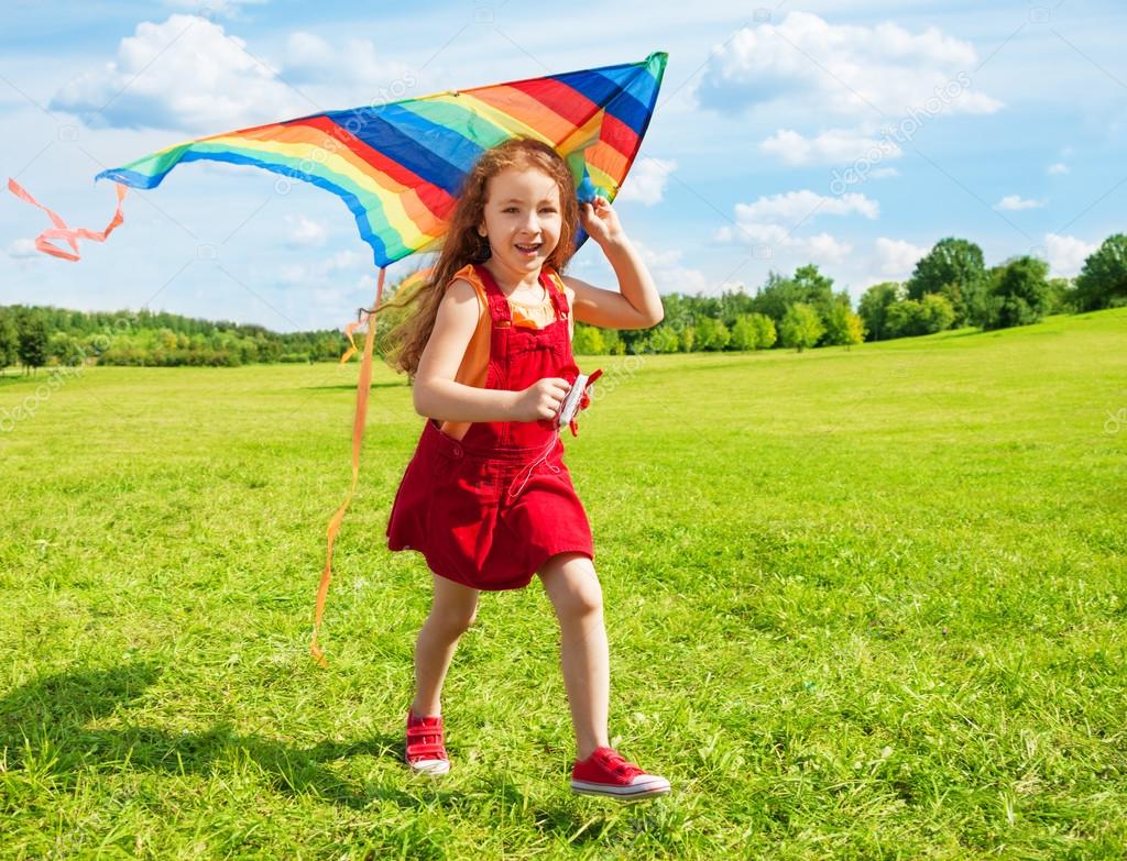 Happy girl with kite — Stock Photo © serrnovik #36199829