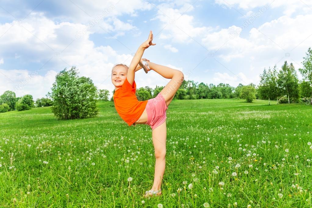 Girl doing gymnastics ⬇ Stock Photo, Image by © serrnovik #49938551