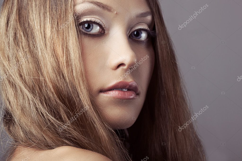 Closeup woman face portrait Stock Photo by ©chesterf 21923229