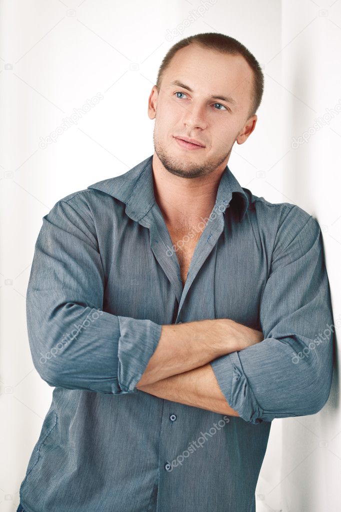 Man standing near wall — Stock Photo © chesterf #22997654
