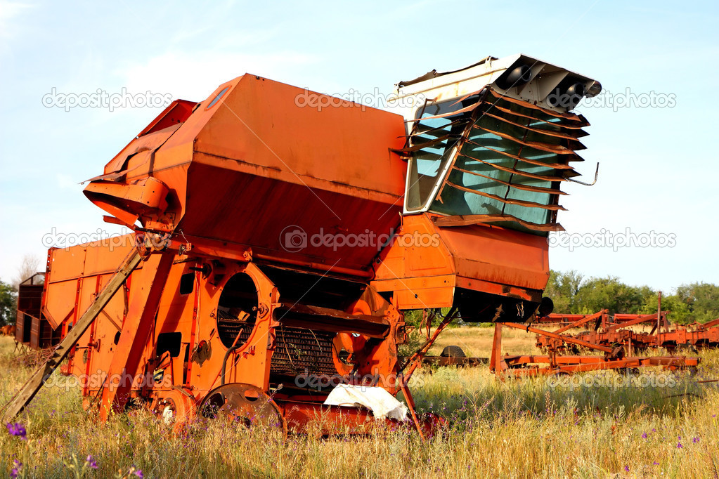 Destroyed combine harvester — Stock Photo © DrTrIg #25757725