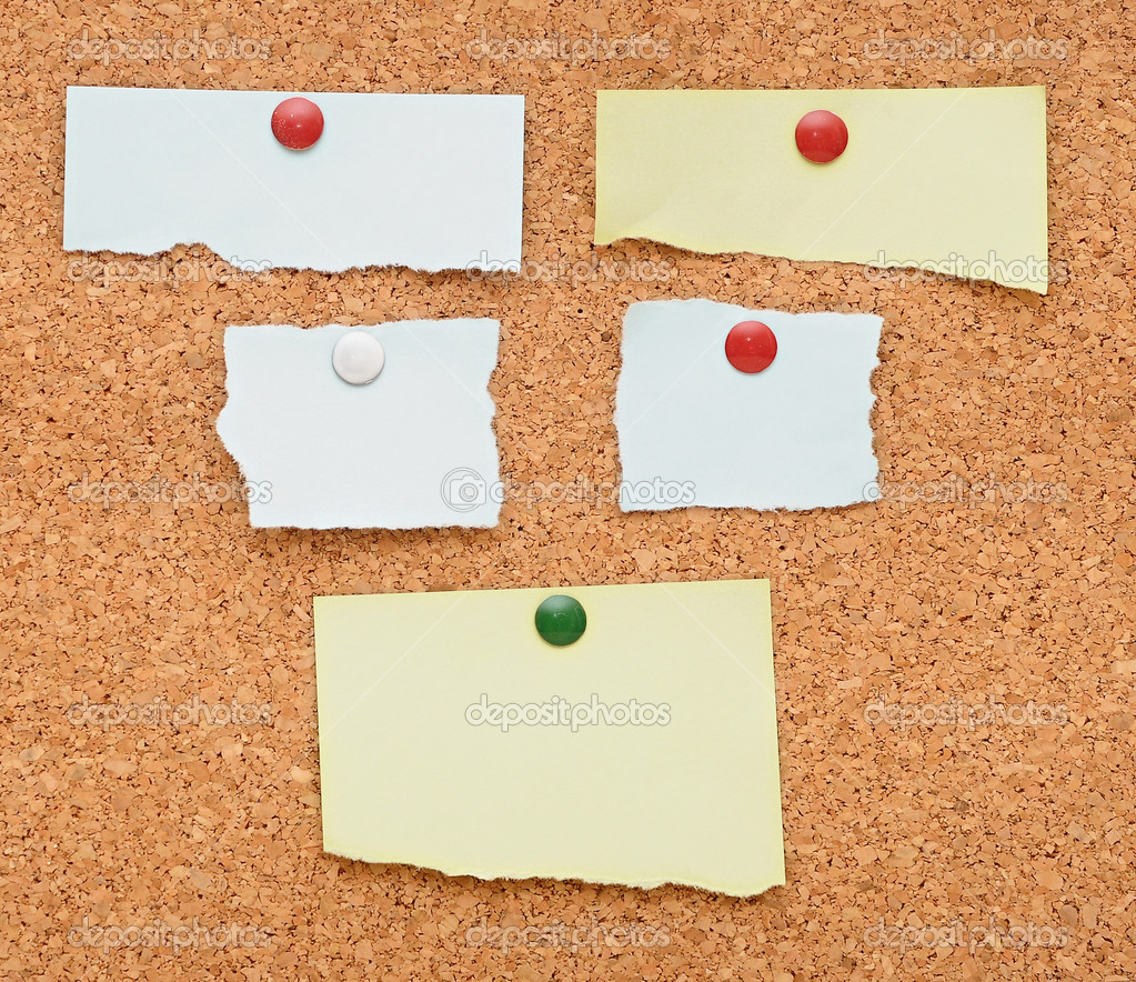 Closeup of torn note papers on cork board — Stock Photo © inxti74 #14429311