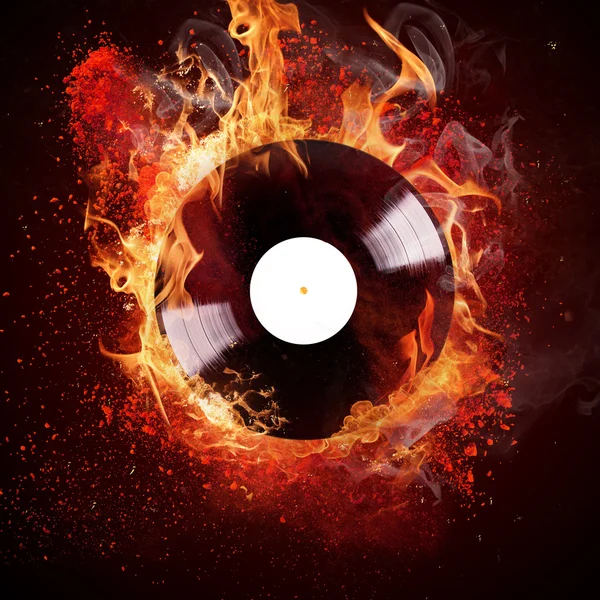 Burning vinyl record isolated over black background Stock Photo by ...