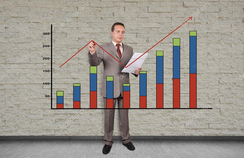 Businessman drawing chart Stock Photo by ©vetkit 31197757