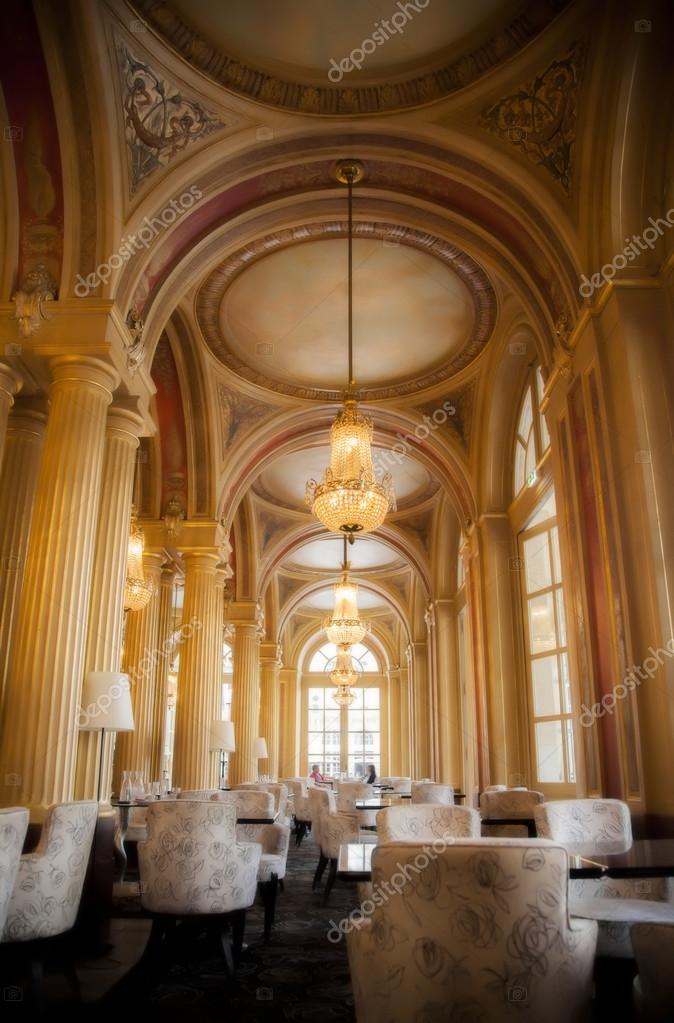 Restaurant interior with golden columns Stock Photo by ©araraadt 12380902