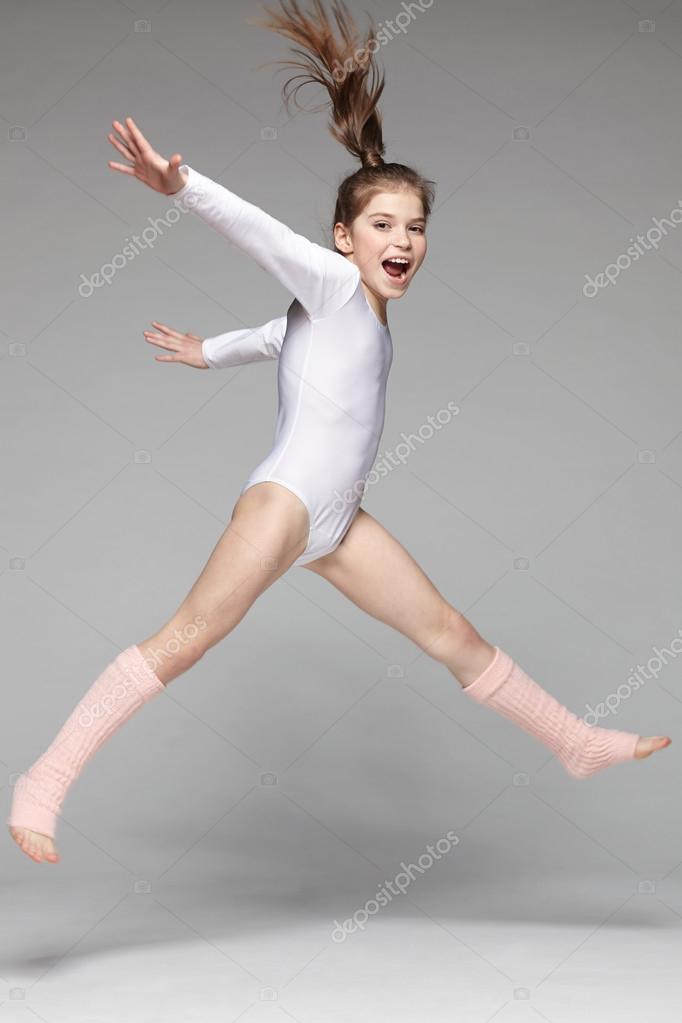 Excited girl jumping Stock Photo by ©pavel_kolotenko 23747573 Excited girl jumping Stock Photo by ©pavel_kolotenko 23747573