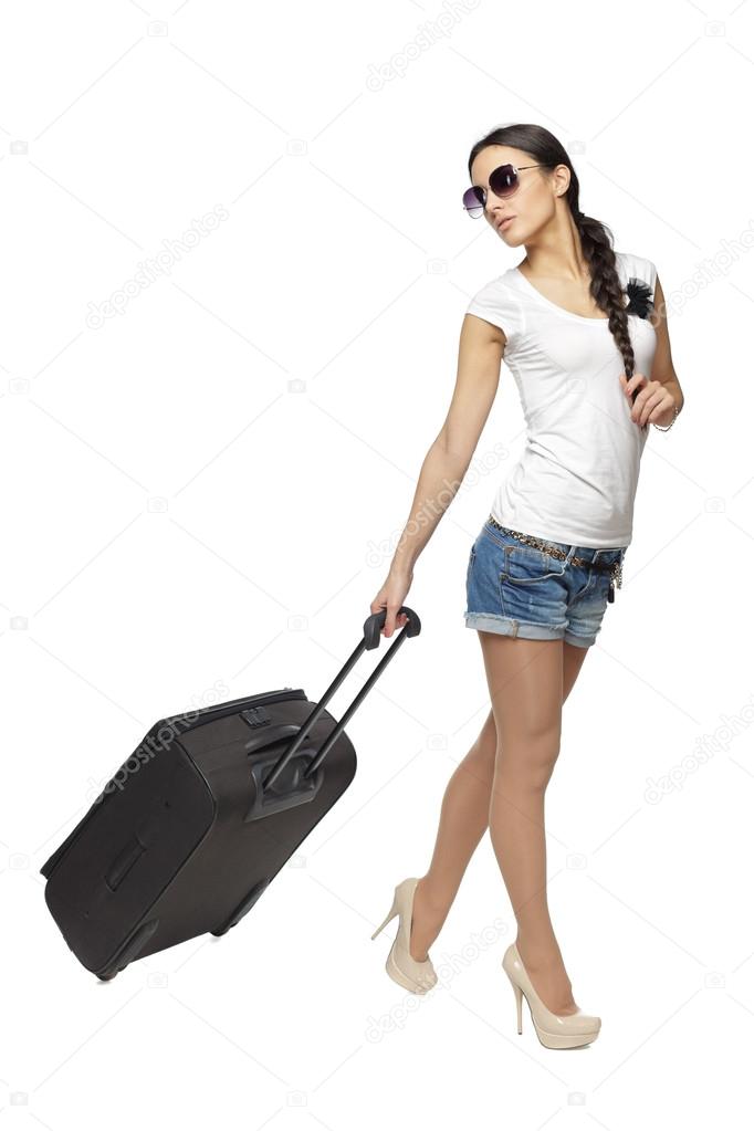 Young female pulling the travel bag Stock Photo by ©pavel_kolotenko ...
