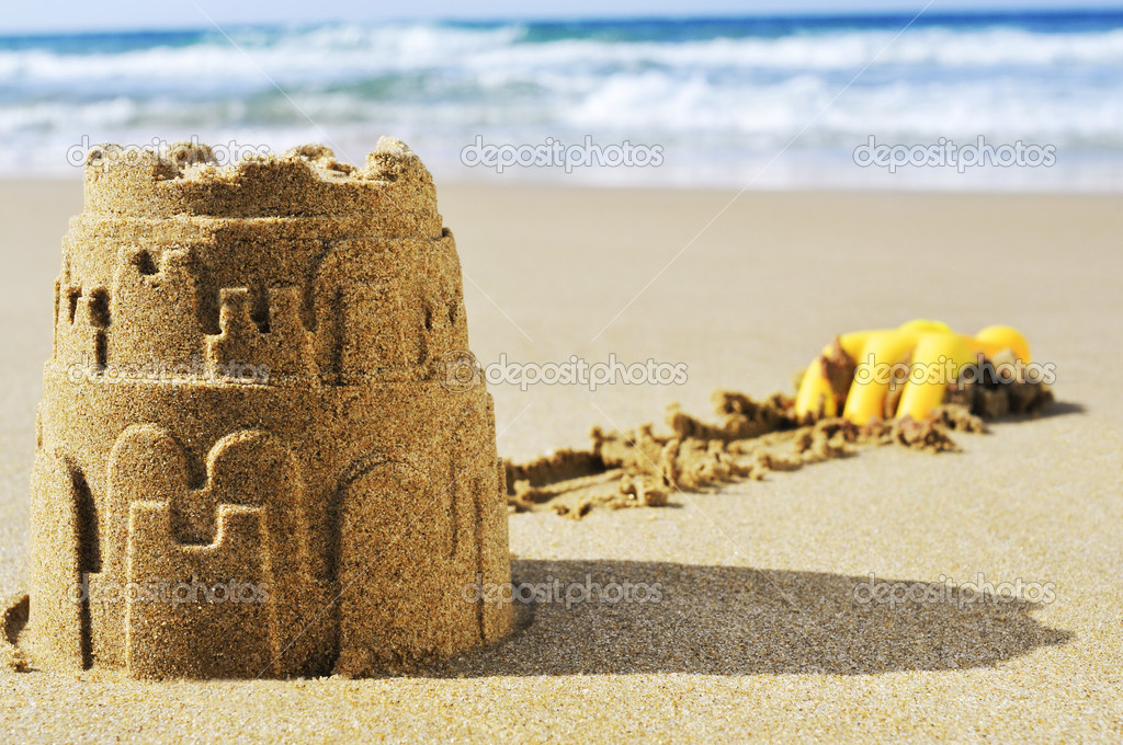 Sandcastle on the sand of a beach Stock Photo by ©nito103 45183869