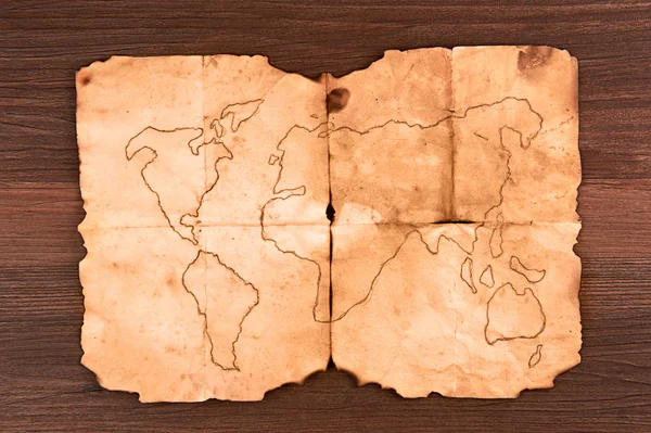 Old vintage map of the world on yellow retro stained paper with knot of ...