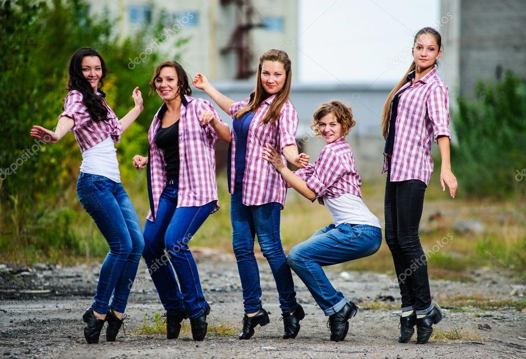Group of yang European tap dancers perform outdoor. Stock Photo by ...