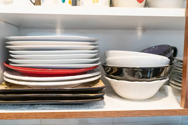 Stack of dishes Stock Photos, Royalty Free Stack of dishes Images ...