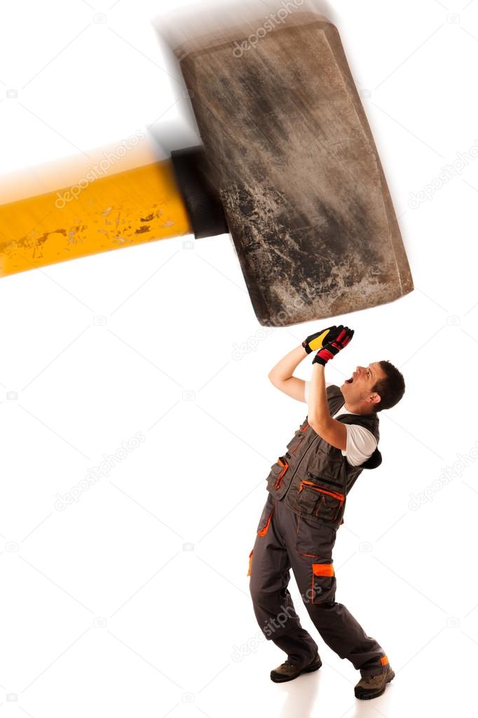 Recession strike work force - Giant hammer smashes worker Employ ...