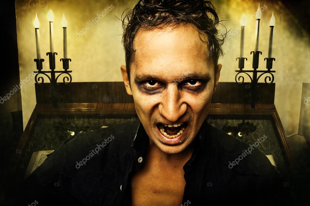 Male vampire with evil eyes Stock Photo by ©katalinks 12637073
