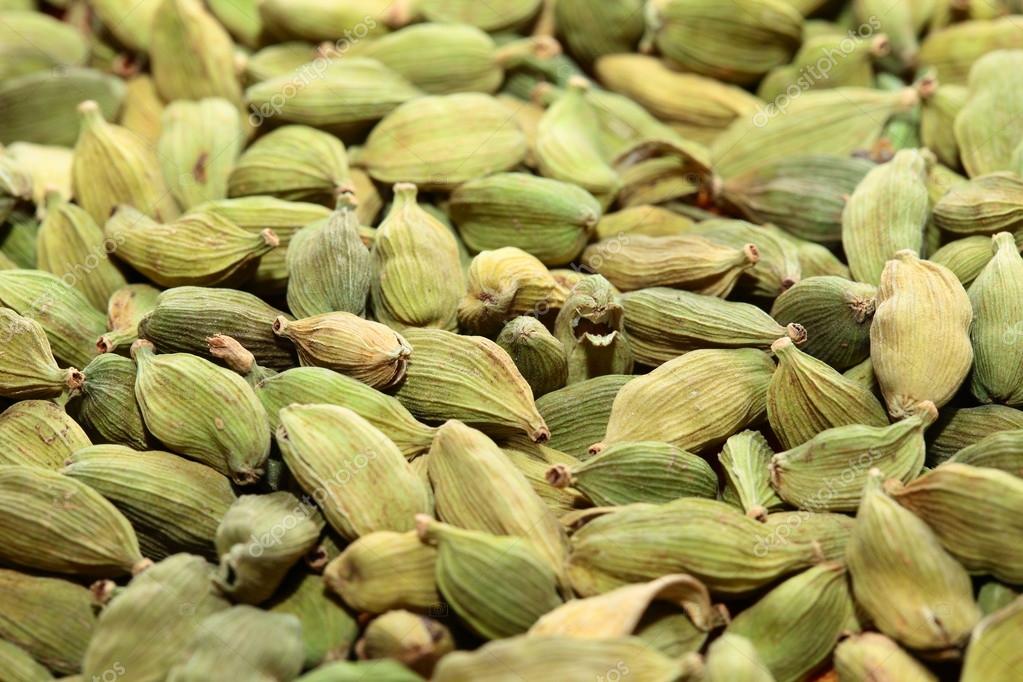 Green cardamom seeds. Aromatic spice.texture background Stock Photo by ...