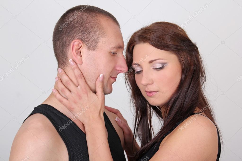 Pretty woman hugging her boyfriend — Stock Photo © Di-Studio #13687840 Pretty woman hugging her boyfriend — Stock Photo © Di-Studio #13687840