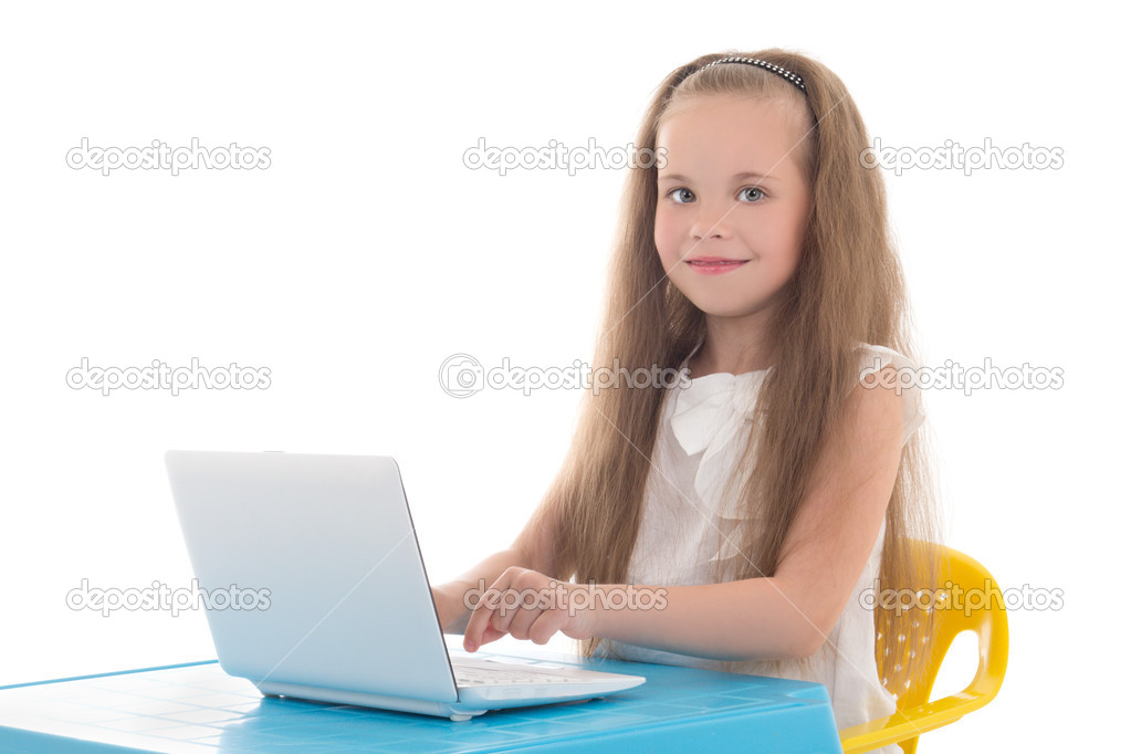 Beautiful little girl using laptop isolated on white Stock Photo by ©Di ...