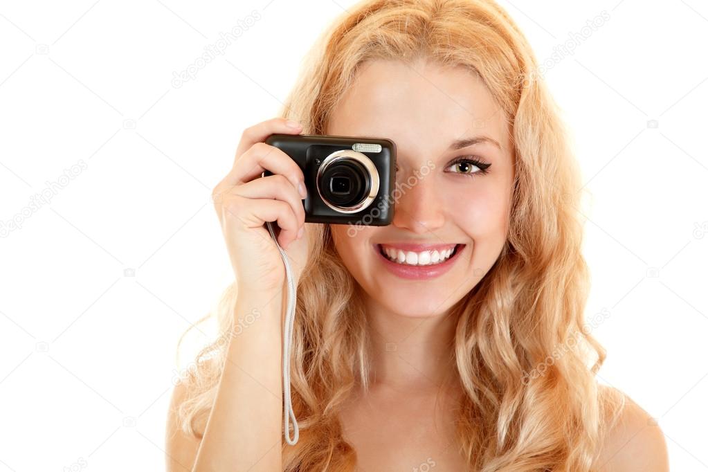Happy young woman doing photos with still camera Stock Photo by ...