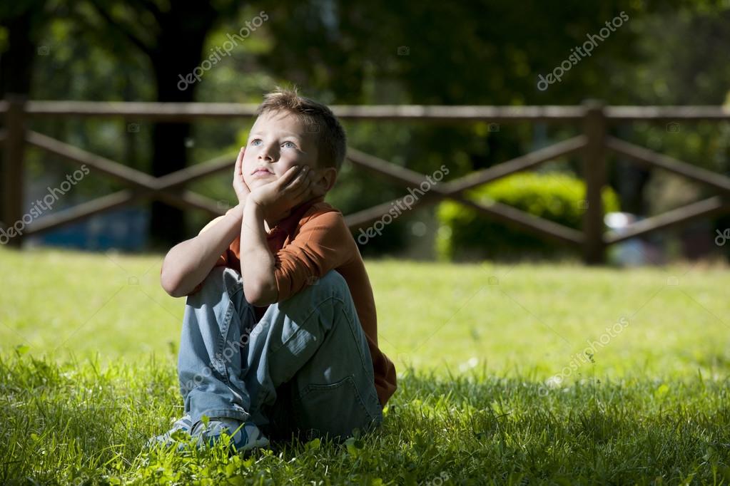 Little boy deep in thoughts — Stock Photo © stefanolunardi #12354721