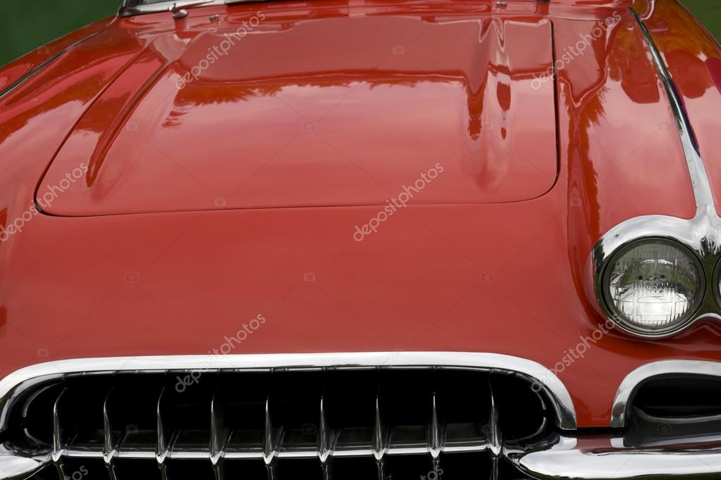 The hood of a classic red sports car — Stock Photo © morrbyte #21384903