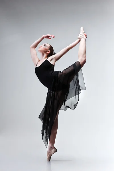 Beautiful ballet-dancer, modern style dancer posing on studio ...