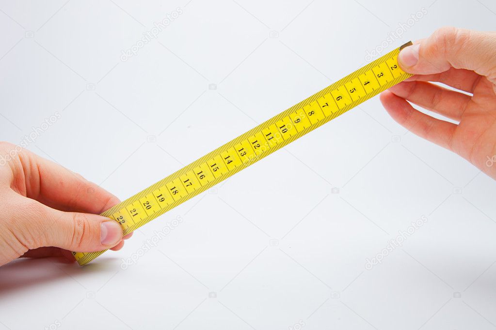Ruler in the hands isolated — Stock Photo © Mulikov #37793419