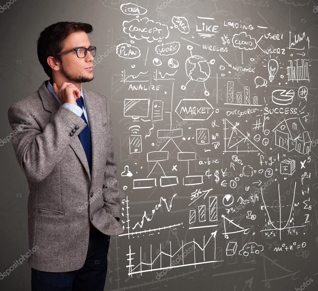 Attractive man looking at stock market graphs and symbols — Stock Photo ...