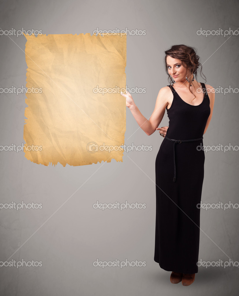 Young girl presenting old paper copy space Stock Photo by ©ra2studio ...
