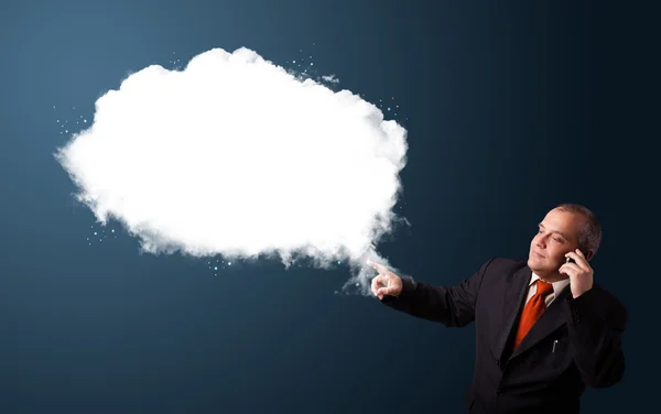 Businessman making phone call and presenting abstract cloud copy ...