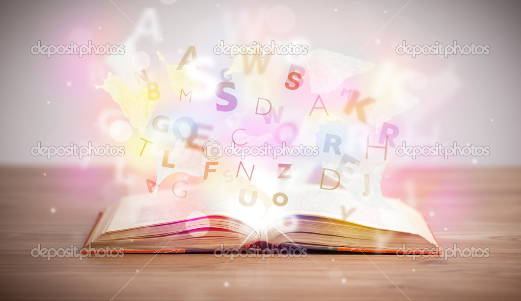 Open book with glowing letters on concrete background Stock Photo by ...