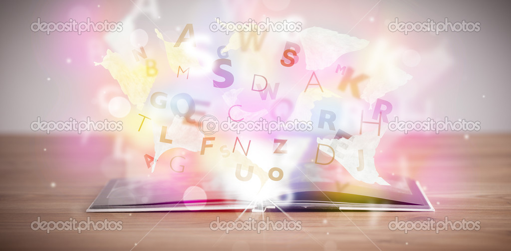 Open book with glowing letters on concrete background — Stock Photo ...