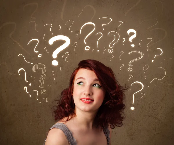 Girl with question mark symbols around her head — Stock Photo ...