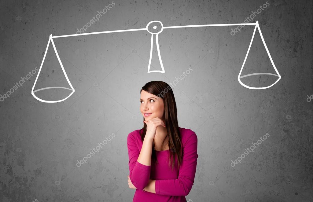 Young woman taking a decision — Stock Photo © ra2studio #42374797
