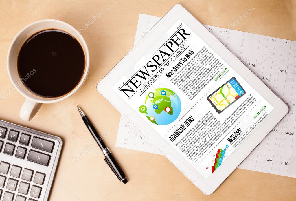 Tablet pc shows news on screen with a cup of coffee on a desk — Stock ...