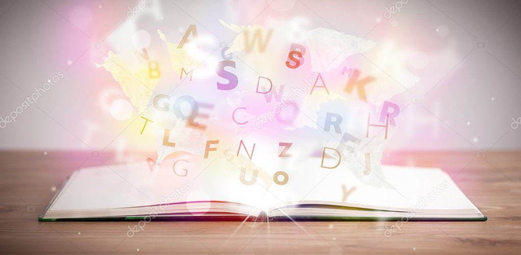 Open book with glowing letters on concrete background — Stock Photo ...