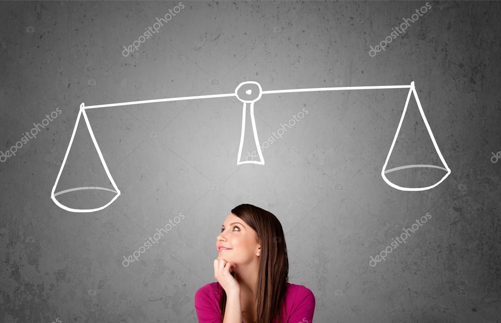 Young woman taking a decision Stock Photo by ©ra2studio 51148459