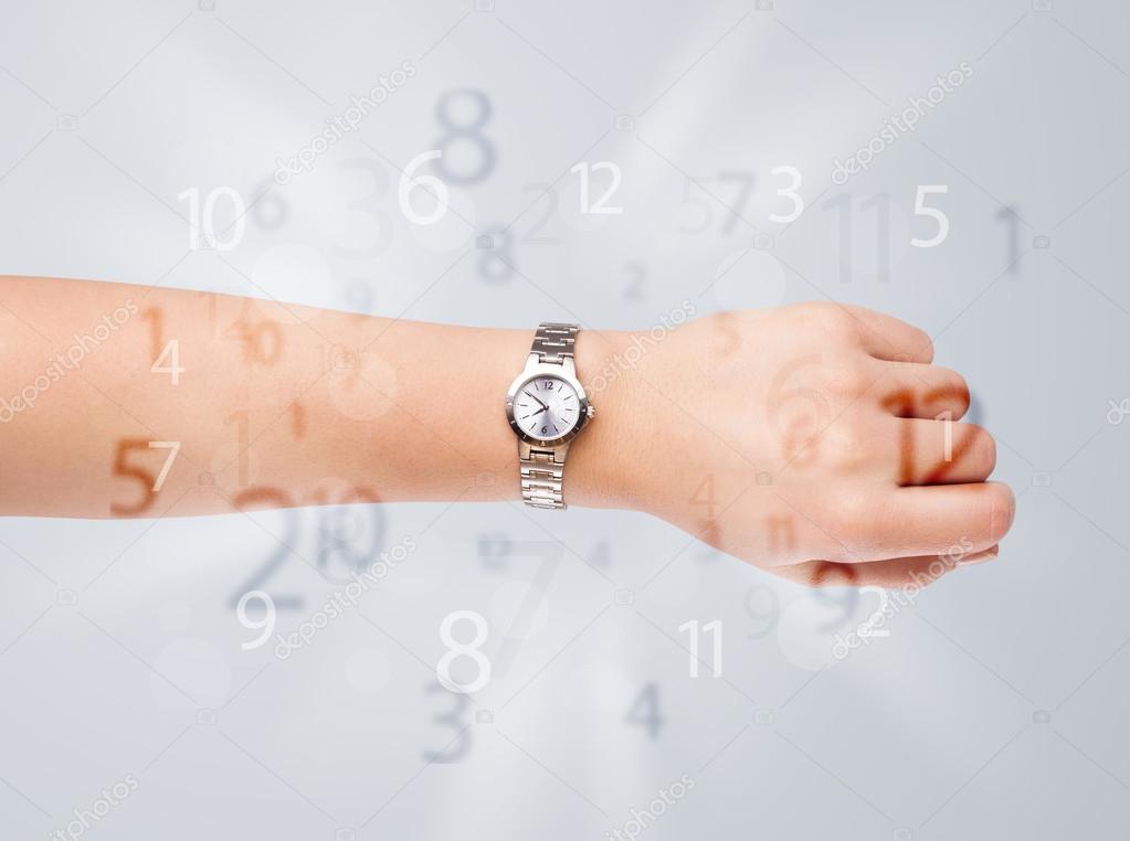 Hand with watch and numbers on the side comming out — Stock Photo ...