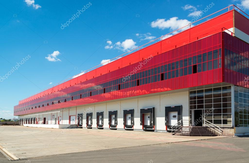 Warehouse on a background of blue sky Stock Photo by ©scaliger 51423883