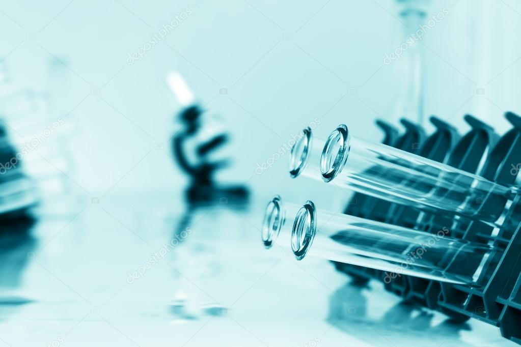 Microscope and test tubes used in laboratory .medical glassware — Stock ...